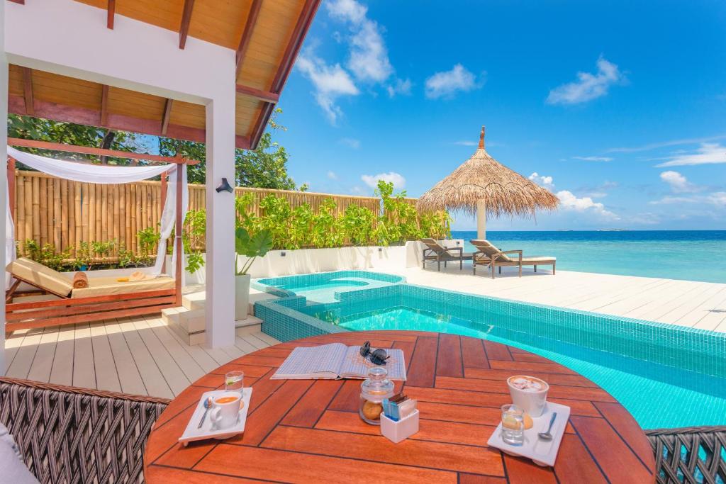 Malahini Kuda Bandos Resort Maldives holiday package @42500